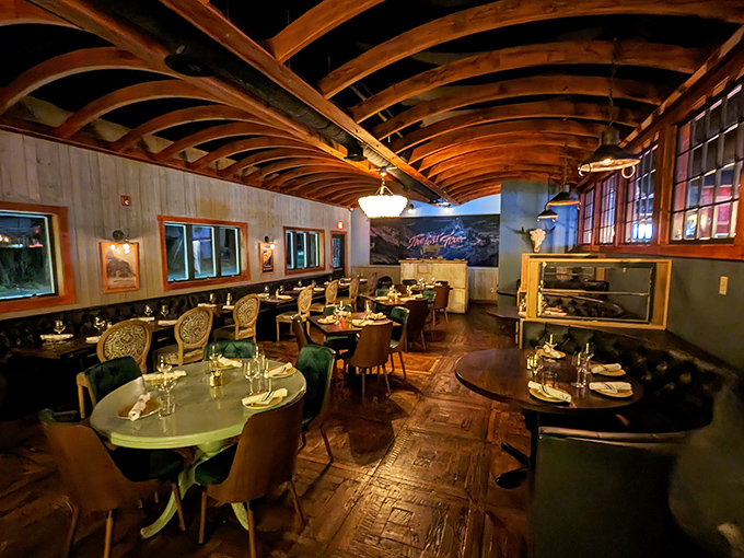 Step inside to discover a dining room where rustic wooden beams meet elegant chandeliers, creating the perfect backdrop for a memorable meal.