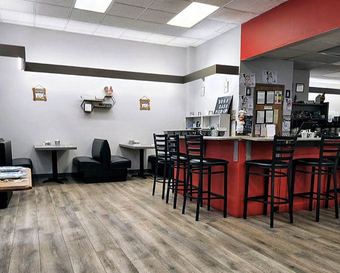 Simple, clean lines define the interior where black, white, and red create a diner atmosphere that puts the focus squarely on what matters: the food.