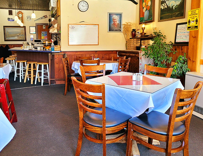 Inside Bernie's, wooden chairs and white tablecloths create that perfect "grandma's dining room" vibe where conversations flow as freely as the coffee.