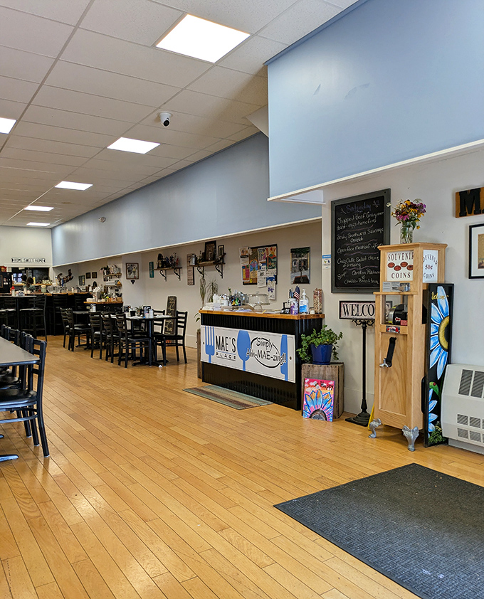 Warm wood floors and soothing blue walls create the perfect backdrop for breakfast magic – comfort you can see before you even taste the food.
