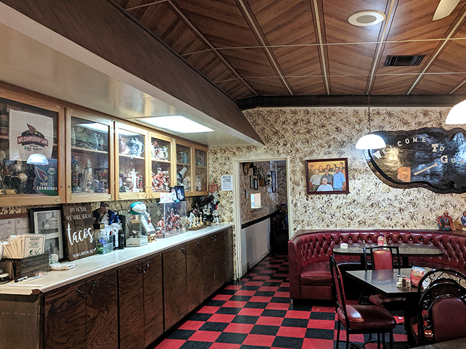 Step inside and time stands still &ndash; burgundy booths, checkerboard floors, and wood-paneled ceilings create the kind of authentic atmosphere money can't buy.