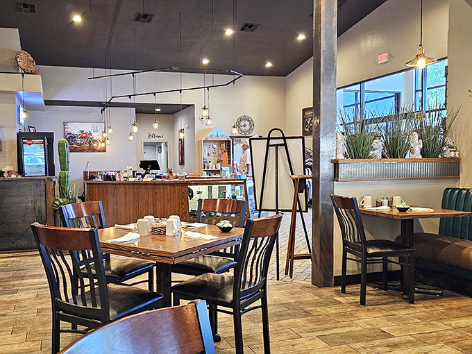 Inside Calico's, warm wood tones and comfortable seating create the perfect backdrop for breakfast magic to unfold.