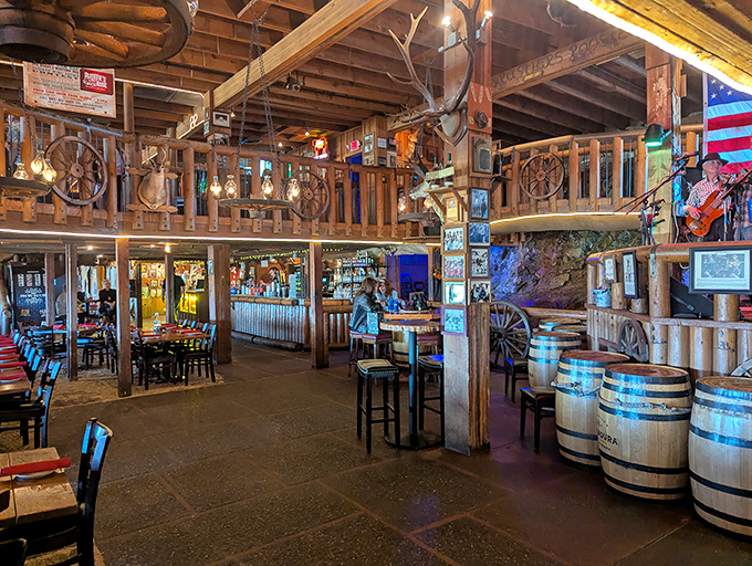 Step inside and travel back in time – wagon wheels, wooden beams, and rustic charm create an authentic frontier atmosphere that John Wayne would approve of.
