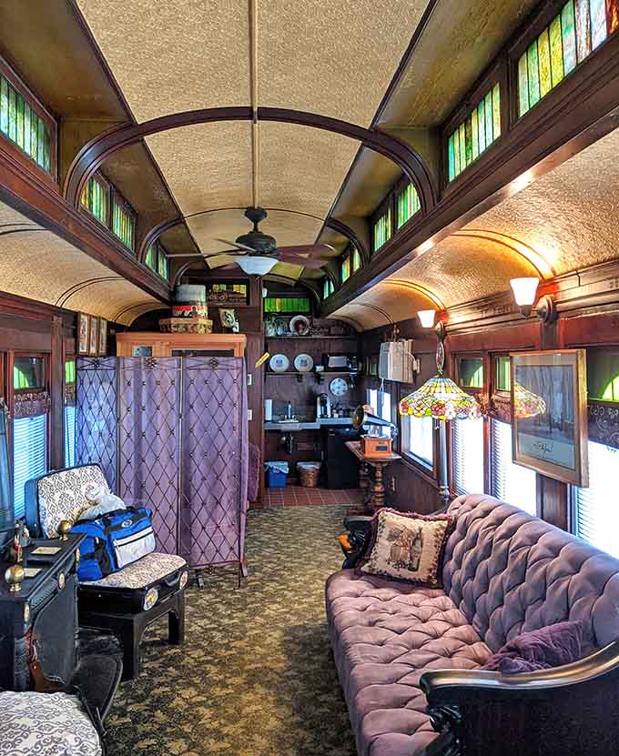 Victorian elegance meets railroad charm in this meticulously restored interior where every detail whispers stories from the golden age of train travel.