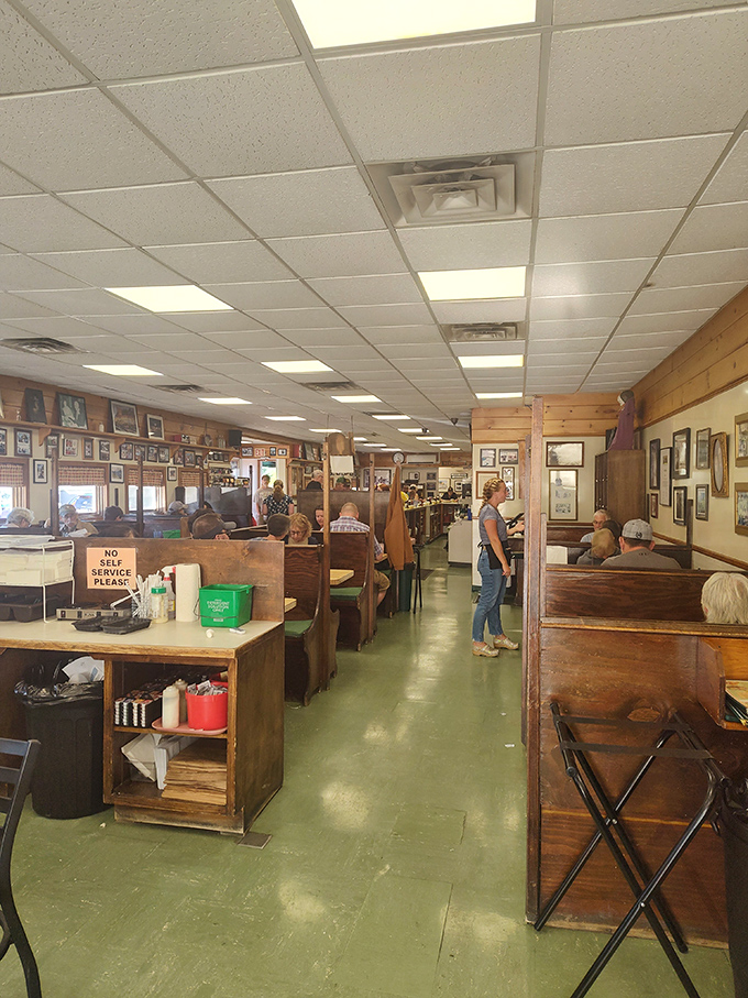 Step inside to discover wooden booths and green floors that have welcomed generations of diners seeking authentic Maine comfort food.