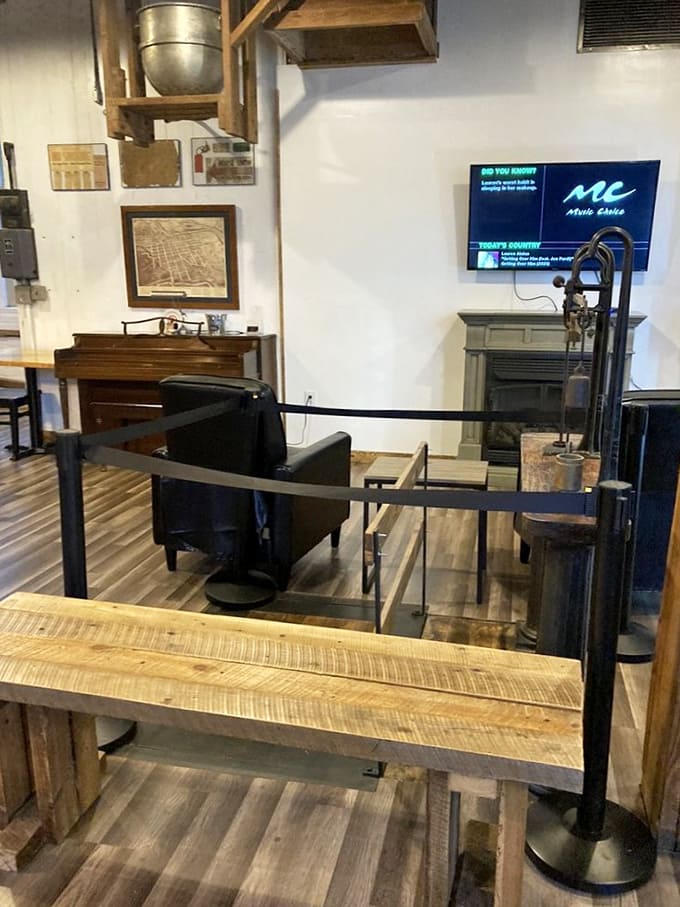 Step inside to discover a warm, rustic interior where exposed beams and a simple "let's eat" sign create the perfect backdrop for carbohydrate-based happiness.