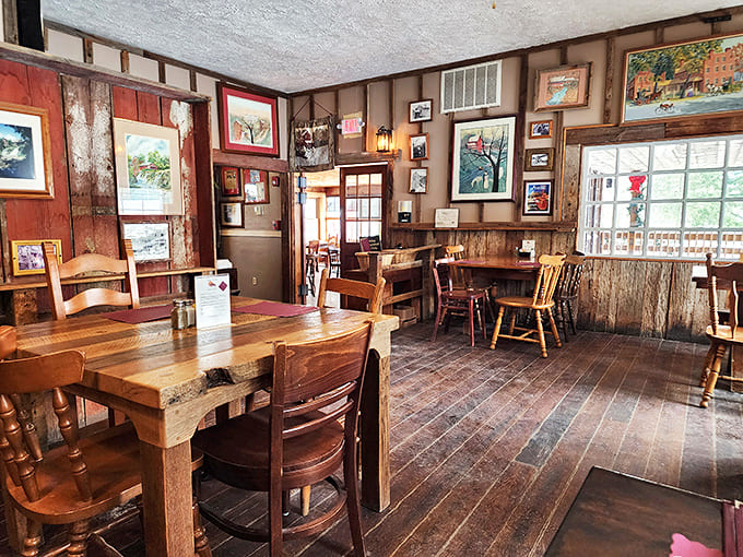 Weathered wooden beams and warm lighting create the perfect backdrop for comfort food that tastes like childhood memories, only better.