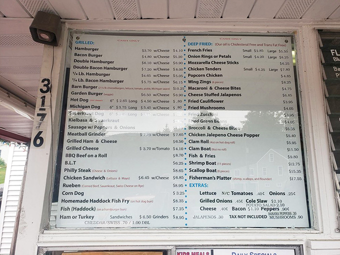 A roadmap to happiness displayed in simple black and white, offering everything from burgers to seafood boats at prices that won't require a second mortgage.