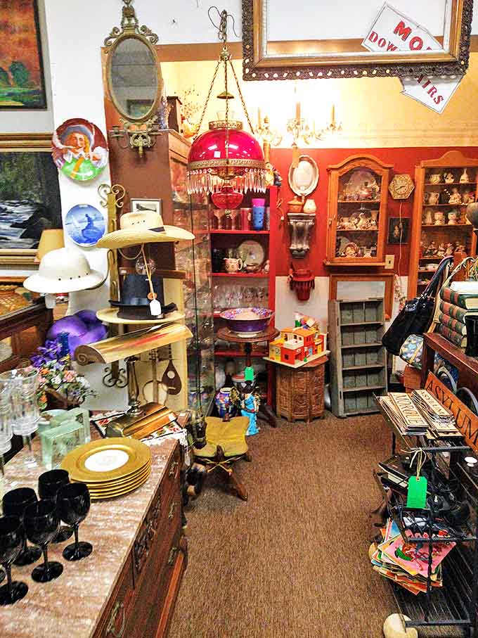 Delicate glassware and vintage plates await new homes, each piece whispering stories of elegant dinner parties and special occasions from decades past.