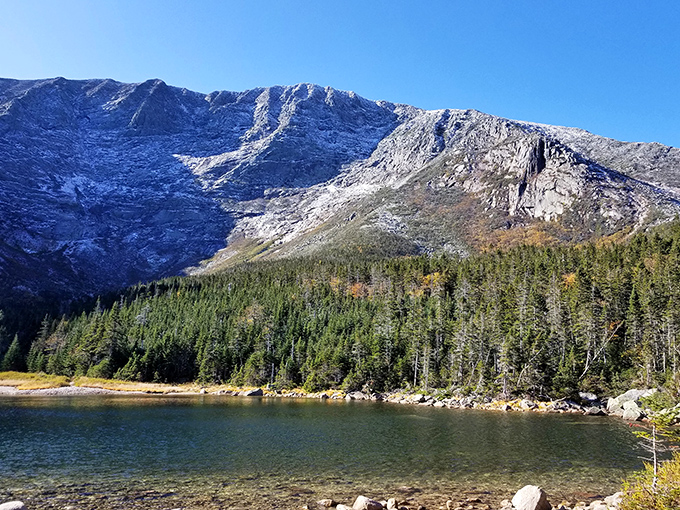 Mirror, mirror on the pond: The glassy surface creates perfect mountain reflections that would make even Narcissus do a double-take.