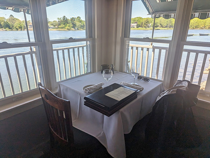 Dinner with a view? Check. This table's got more waterfront real estate than a lobster's summer home.