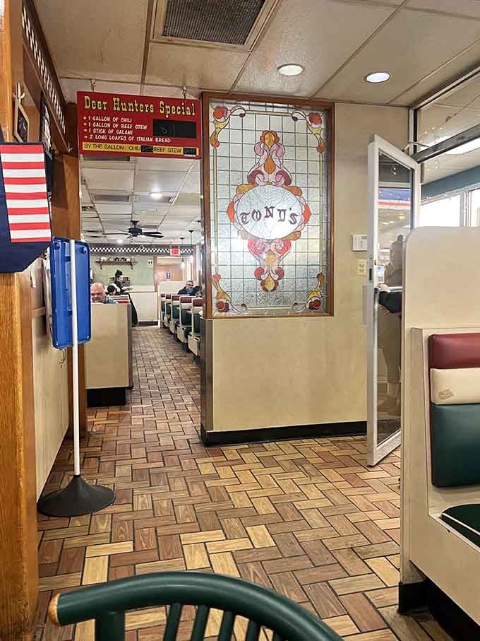 Classic diner vibes meet checkered racing stripes in this cozy comfort food paradise.
