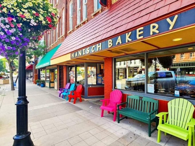 Colorful chairs invite you to plop down and indulge. It's like a bakery hug&mdash;warm, inviting, and guaranteed to leave you feeling good inside. 