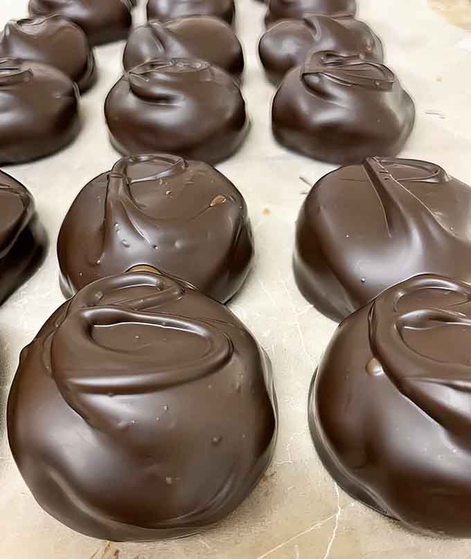 These glossy chocolate beauties with peanut butter cream centers are basically happiness in edible form, smooth and irresistible.