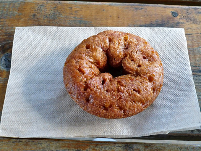 The star of the show &ndash; a perfect apple cider donut with that signature golden-brown exterior and tender, spiced interior that keeps locals coming back weekly.