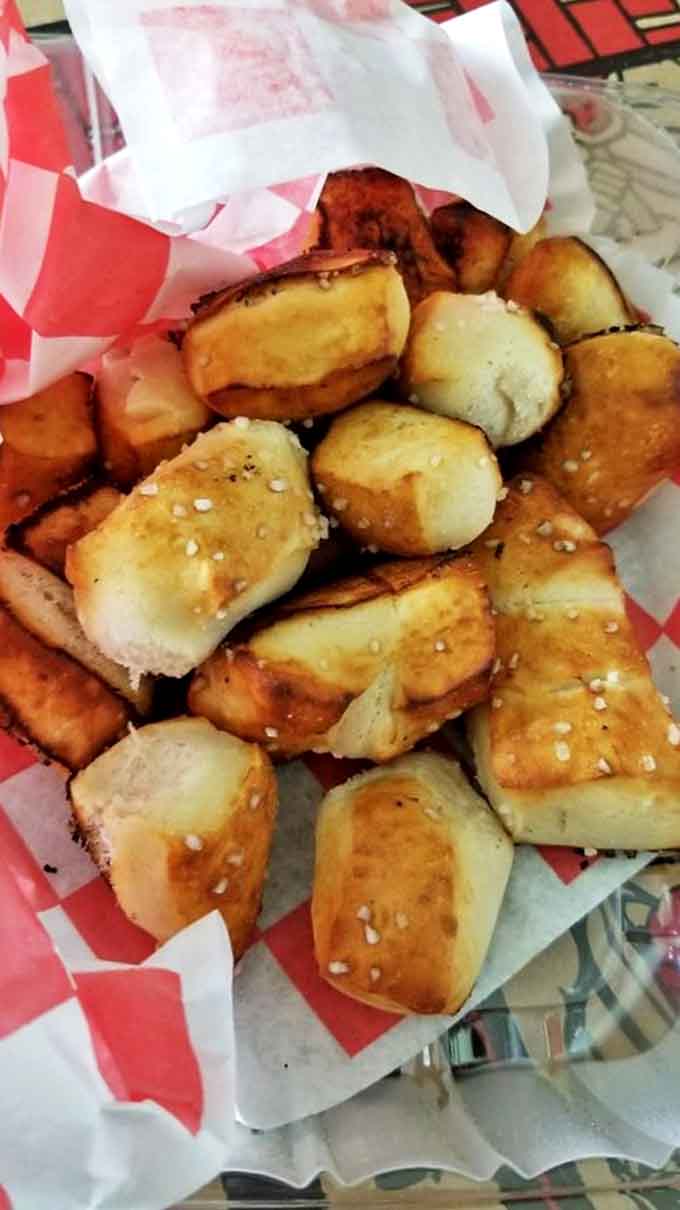 Golden-brown perfection with glistening salt crystals, these aren't your average mall pretzels, folks. They're the stuff of carb-loaded dreams.