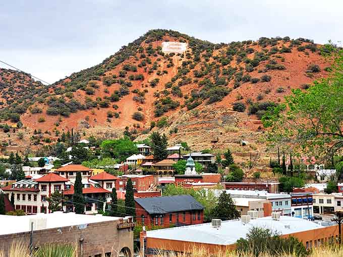 Victorian architecture stacks up the hillside in a rainbow of colors, as if someone decided boring beige was simply unacceptable in this corner of Arizona.