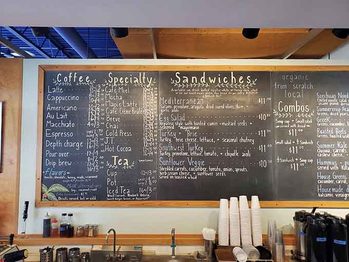 That chalkboard menu isn't just for show—it's your roadmap to breakfast bliss, featuring everything from Mediterranean-inspired sandwiches to that legendary frittata everyone's talking about.