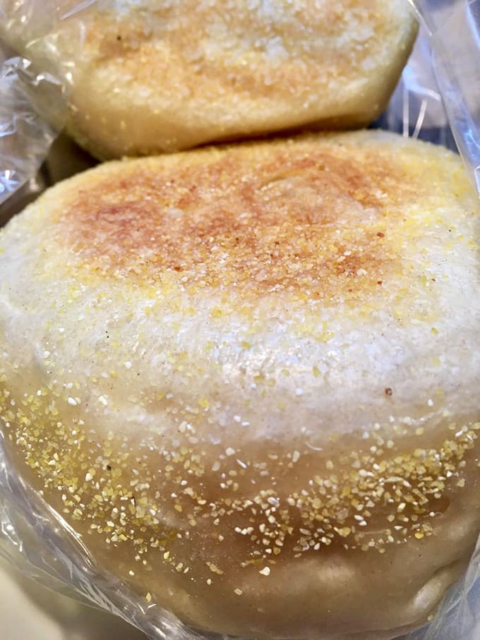 Golden, pillowy English muffins with that perfect dusting of cornmeal, ready to transform your breakfast into something extraordinary.