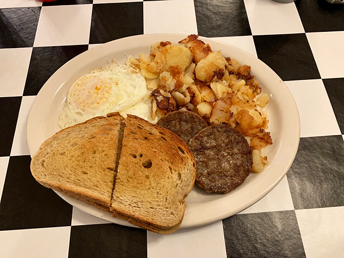 The breakfast of champions, or anyone who appreciates a perfect sunny-side up egg and crispy home fries. Pure morning bliss!