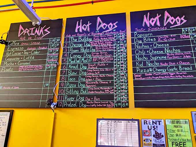 The menu board showcases creative hot dog concoctions with names that would make Stan Lee chuckle with approval.