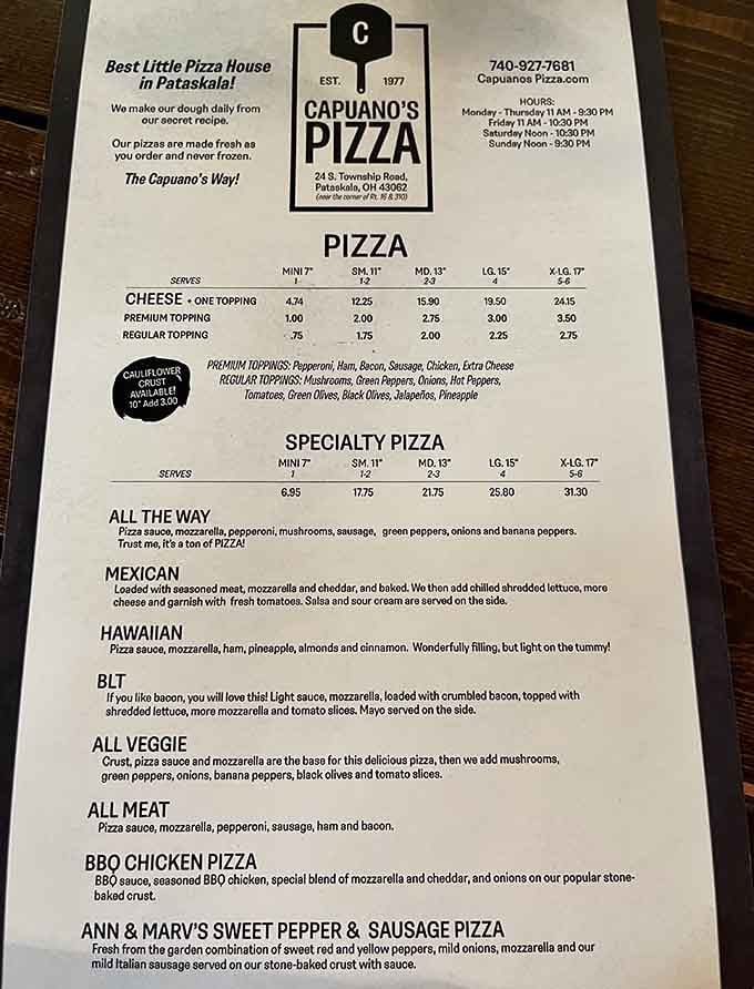 This menu board tells you everything you need to know: straightforward options, honest descriptions, and pizzas made fresh to order daily.