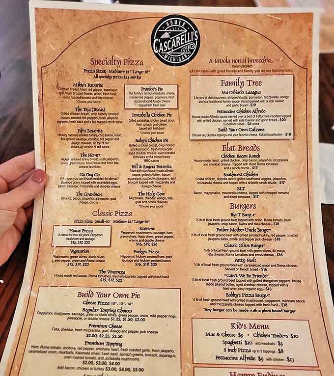 The menu reads like a family scrapbook, with specialty pizzas named after locals and legendary combinations that have stood the test of time.