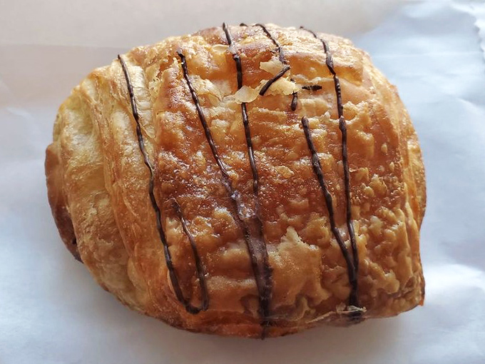 Chocolate drizzle transforms this already perfect pastry into a work of art that's almost too beautiful to eat. Almost.