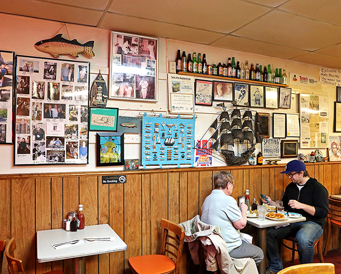 A wall of memories that could rival your aunt's Facebook photo dump, but with 100% more nautical charm.