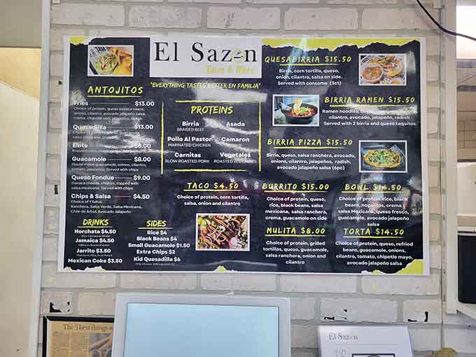 The menu board showcases an impressive array of authentic Mexican dishes, from birria to quesadillas, all at prices that won't empty your wallet.