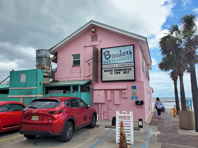 That cotton-candy pink exterior isn't just a building&mdash;it's a landmark that's been serving up ocean views and good times for generations.