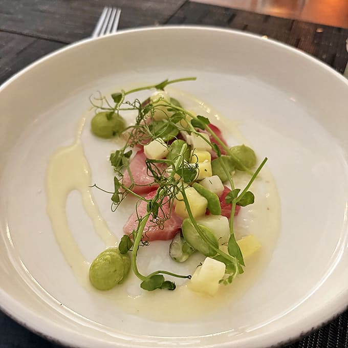 This isn't just fish; it's an edible watercolor painting. The crudo arrives looking too beautiful to eat, but you'll get over that quickly.