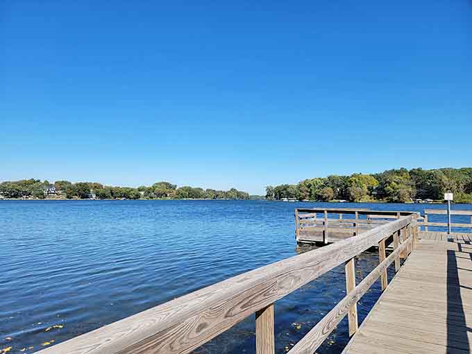 That dock knows more secrets than a therapist's notebook, standing ready for your next contemplative moment or fishing expedition.