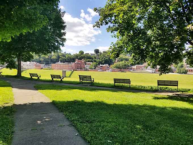 Grant Park's benches facing the river understand something important: sometimes the best entertainment is just watching water flow by.