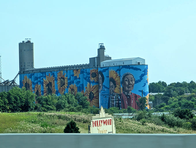 Even from the highway bridge, the mural commands attention, making every commute a little more interesting than it has any right to be.