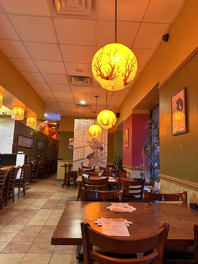 Traditional Japanese lanterns transform this suburban space into an intimate dining sanctuary, perfect for both date nights and solo adventures.