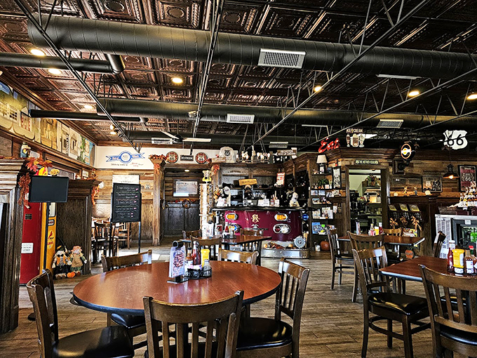 Classic diner ambiance meets roadhouse cool, with tin ceiling details and enough Route 66 signs to navigate you straight to comfort food heaven.