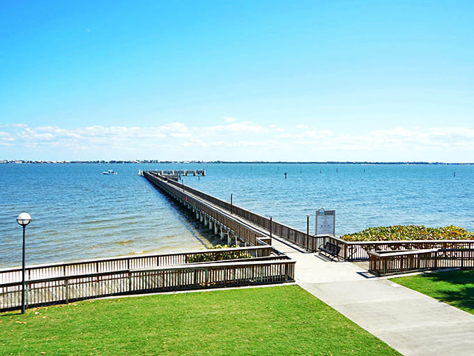 This wooden walkway stretches toward the horizon like an invitation to adventure, connecting land-dwellers to the watery playground beyond.