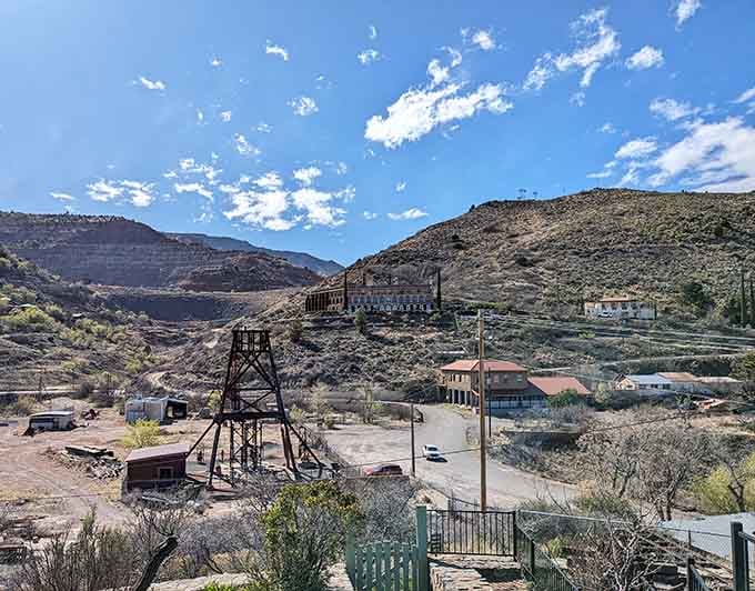 The historic mining structures stand as silent sentinels overlooking the valley, reminding visitors that this artistic haven was once one of the world's most productive copper mining operations.