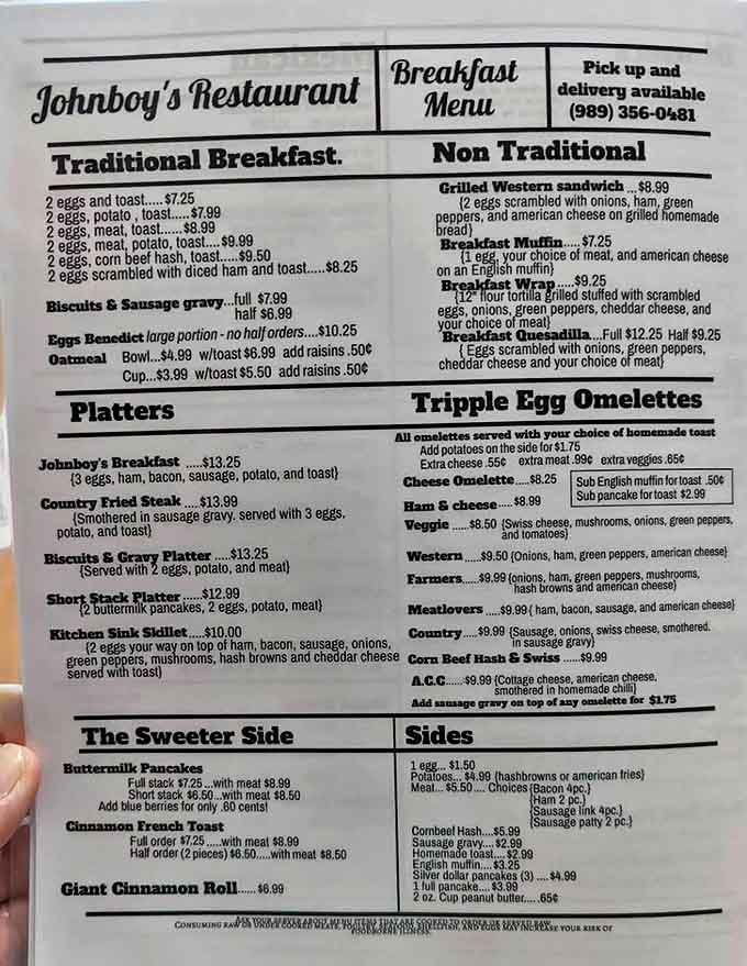 Menu: A roadmap to comfort food paradise, featuring everything from triple egg omelets to that legendary giant cinnamon roll that's worth the drive alone.