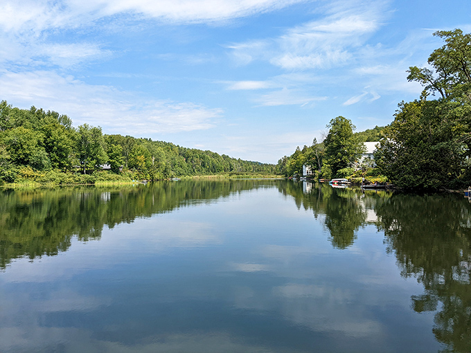 Mirror-perfect reflections double the visual impact of Vermont's landscape, creating a photographer's dream at every angle.