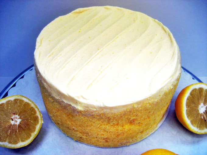 The legendary Lemon Fluff Cake in all its golden glory – a dessert so light it practically defies gravity while delivering sunshine in every bite.