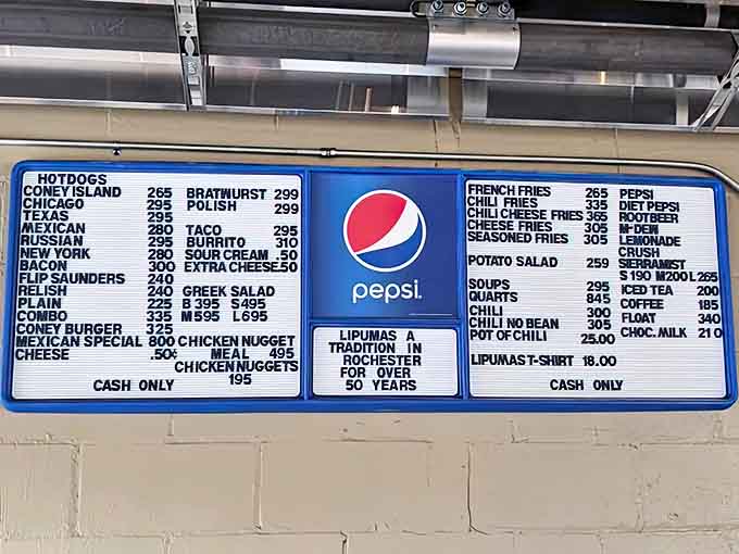 Menu: The wall-mounted menu board tells you everything you need to know &ndash; decades of hot dog tradition captured in glowing simplicity.