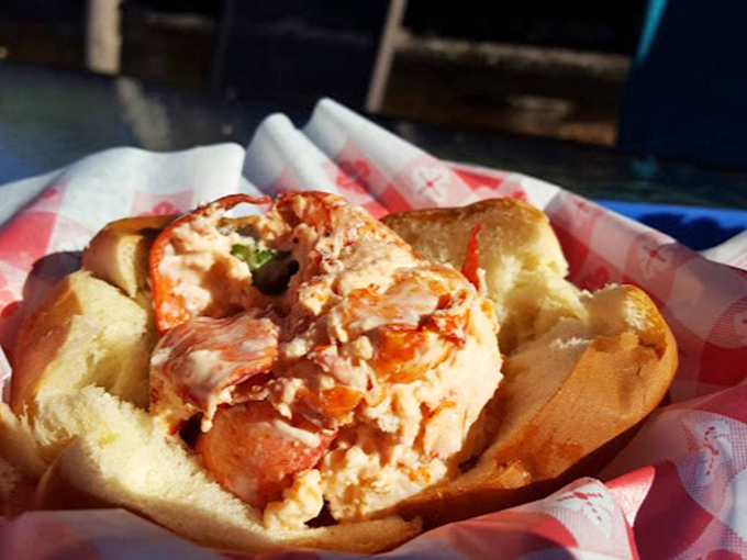 Behold, the Mona Lisa of lobster rolls! Each bite is a masterpiece of sweet meat and buttery bun.
