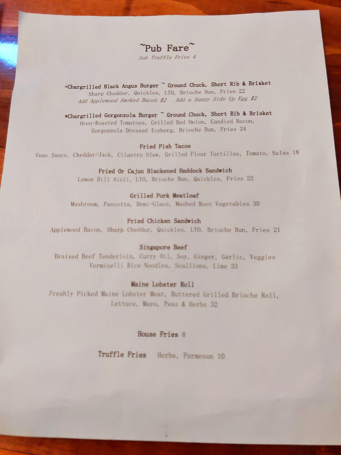 The pub menu tempts with indulgent offerings like truffle fries and a burger that combines chuck, short rib, and brisket.
