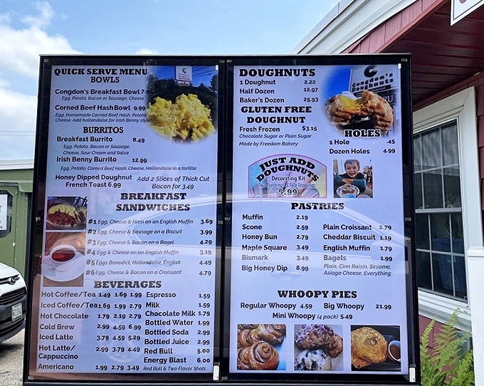 Decisions, decisions! The menu board showcases breakfast classics and doughnut varieties that have kept locals coming back for generations.