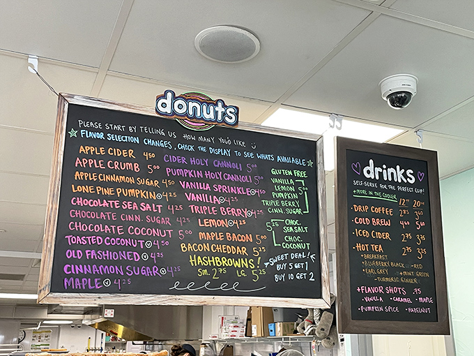 The colorful chalkboard menu reads like a love letter to donut possibilities &ndash; from Apple Cider to Holy Cannoli varieties, each option more tempting than the last.