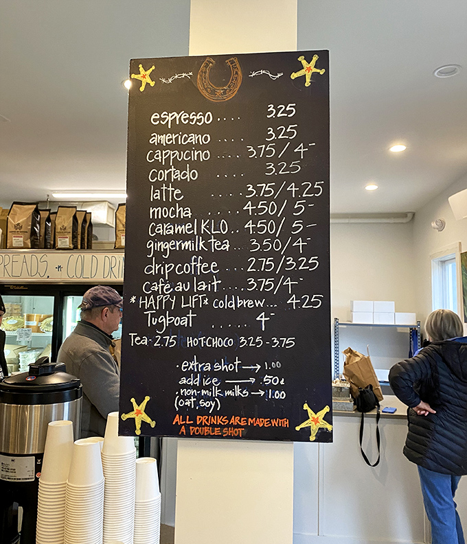 The coffee menu board, adorned with starfish decorations, promises caffeinated bliss to complement your carbohydrate adventure.