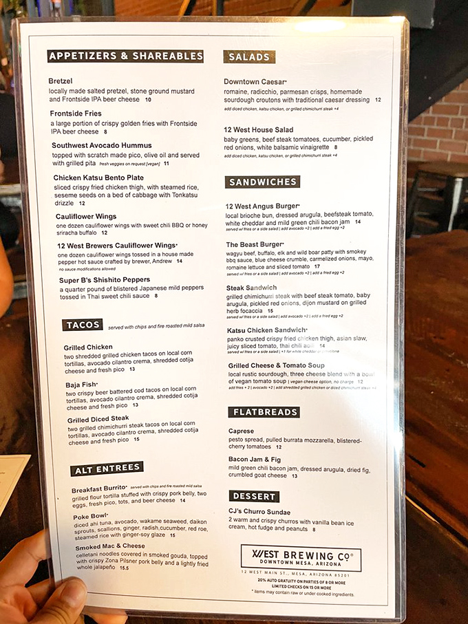 The menu at 12 West reads like a love letter to comfort food, elevated with craft beer infusions and locally-sourced ingredients.