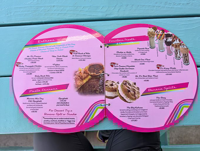 The heart-shaped menu offers comfort food classics alongside Route 66 specialties &ndash; reading it feels like planning a delicious adventure.